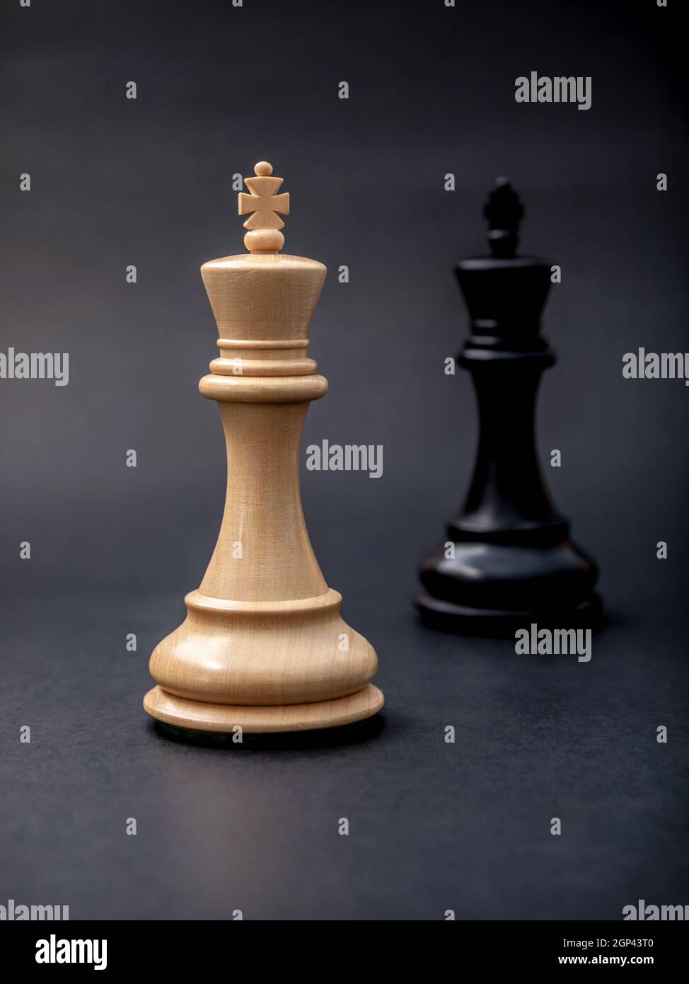 Black and white king of chess set up on dark background Stock Photo - Alamy