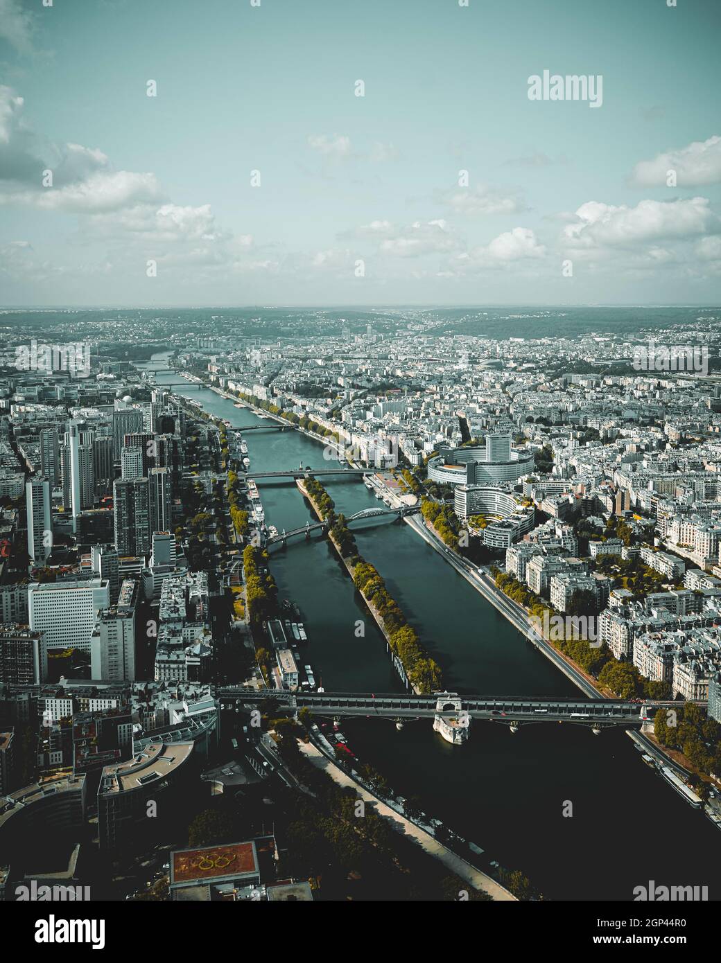 Vertical shot of a city view of Paris from the top of the Eiffel Tower ...