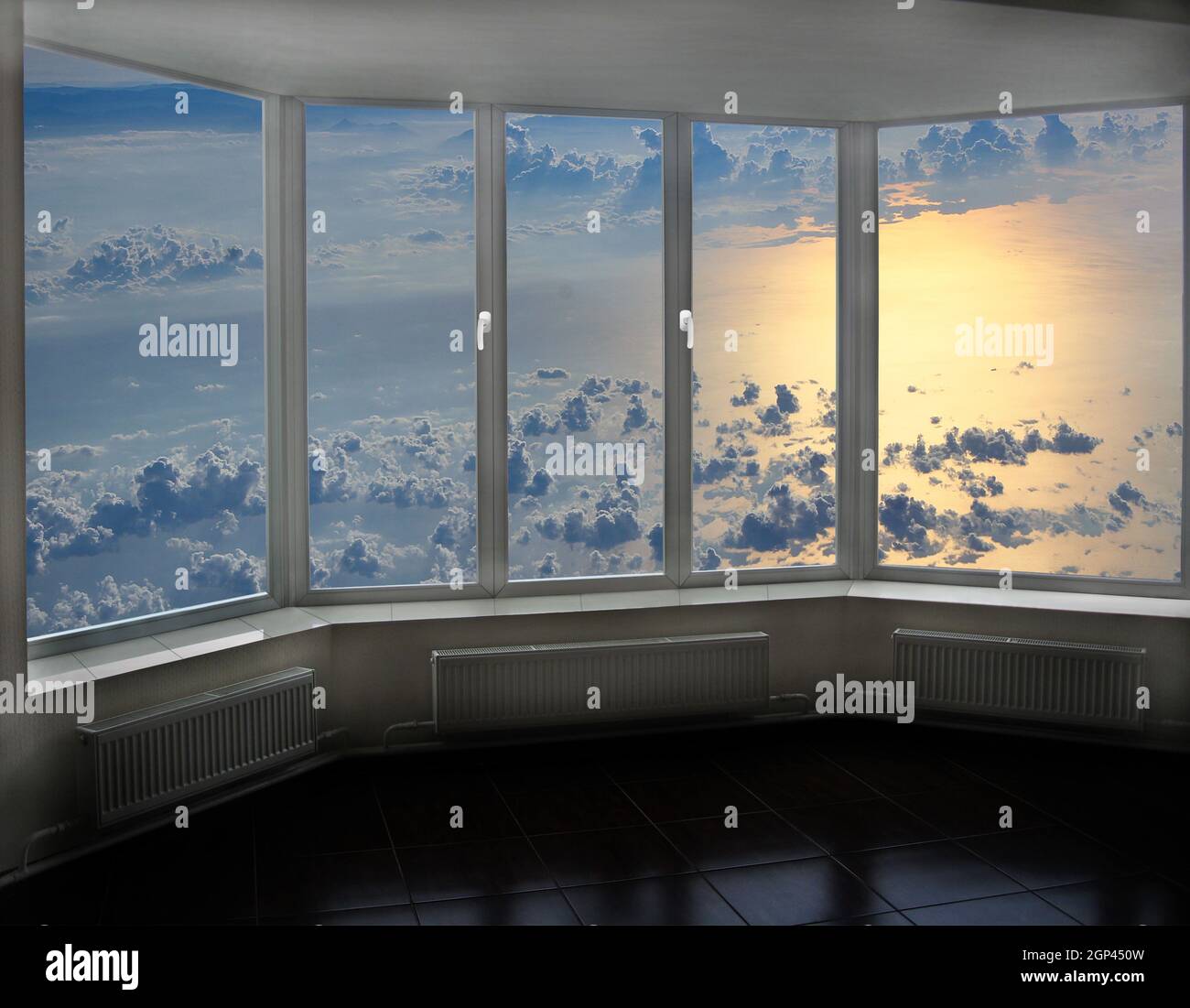 Cozy room overlooking clouds above sea. Landscape with clouds above ...