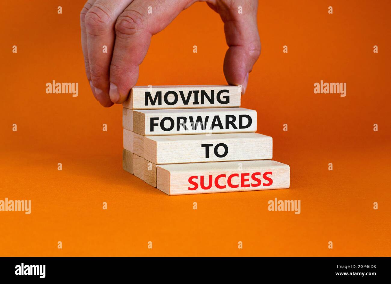 Moving forward to success symbol. Concept words 'Moving forward to ...