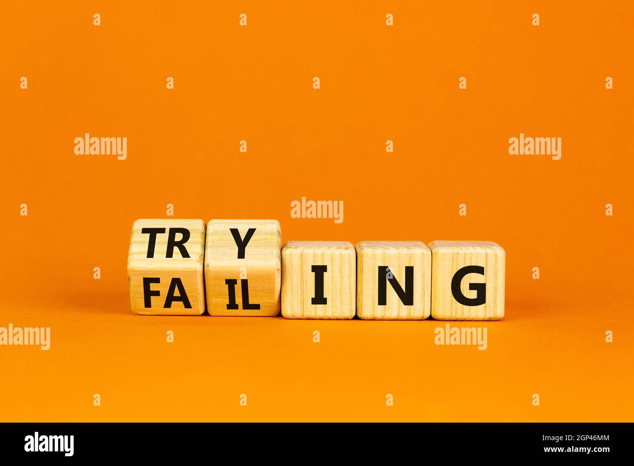 Failing or trying symbol. Turned wooden cubes and changed the word ...