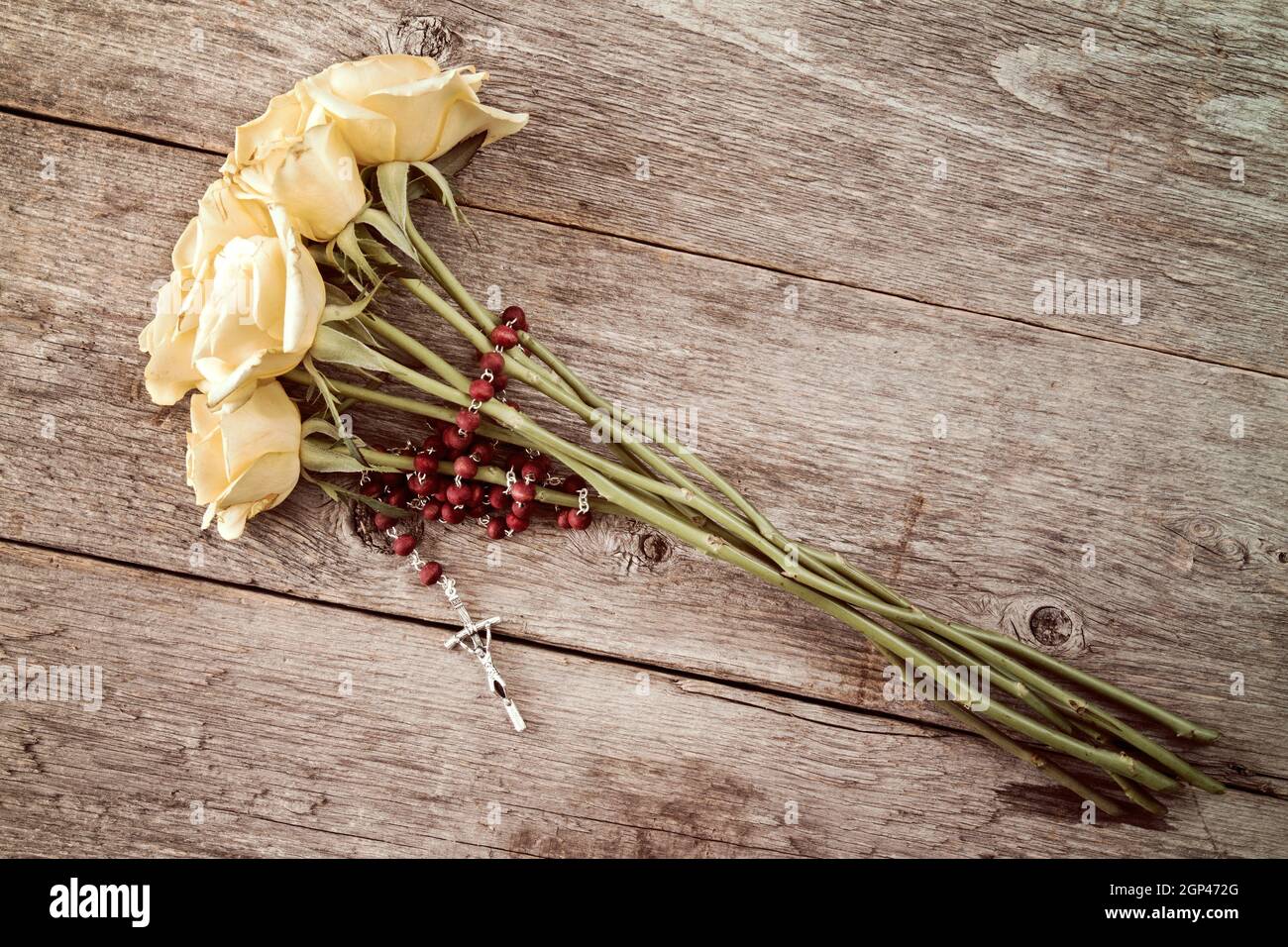 Cross crucifix rose roses hi-res stock photography and images - Alamy