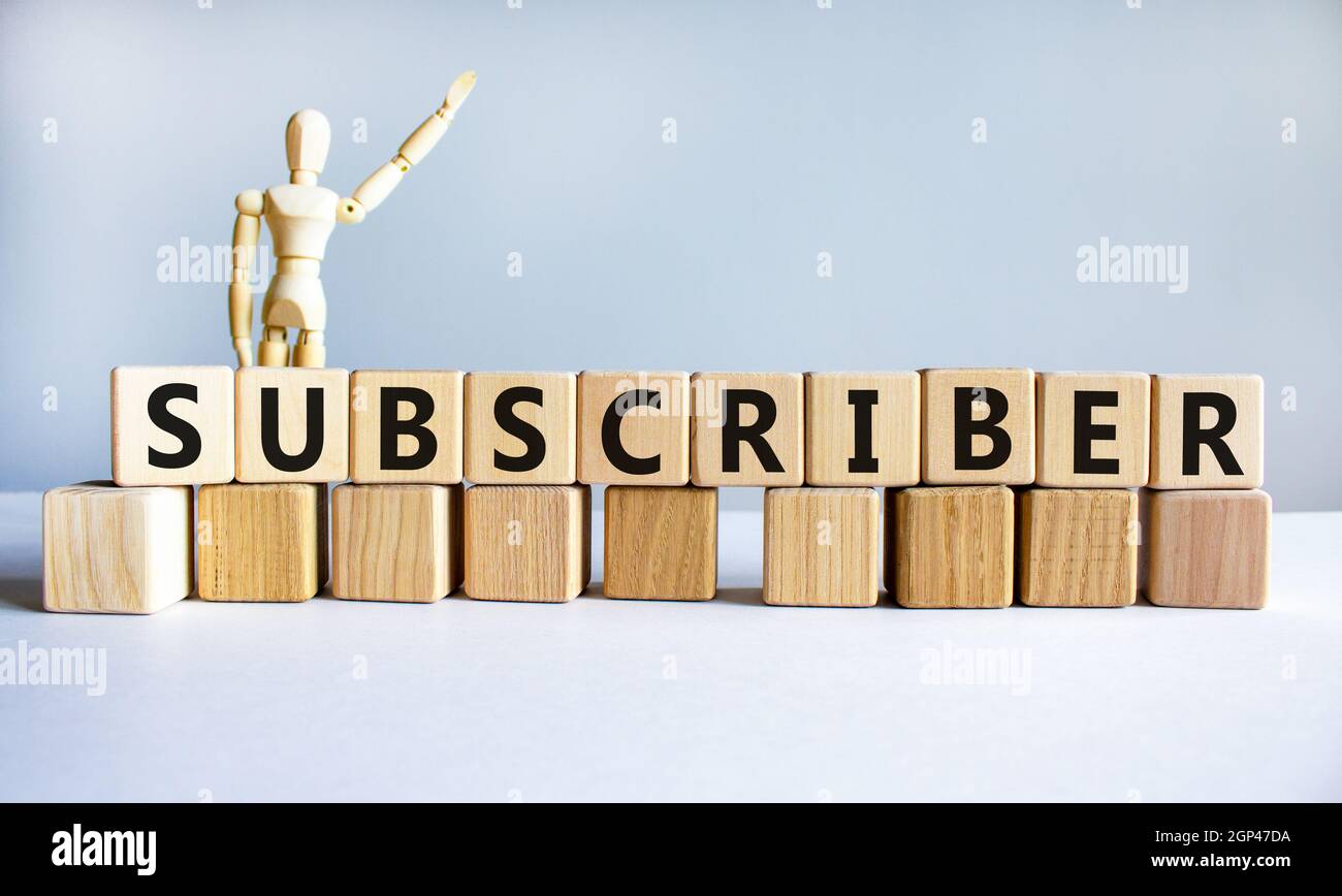 Subscriber symbol. The word Subscriber on wooden cubes. Wooden model of ...