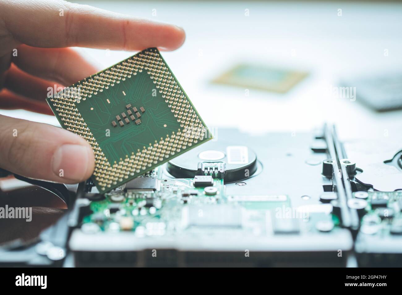 Male hand holding microprocessor hi-res stock photography and images ...