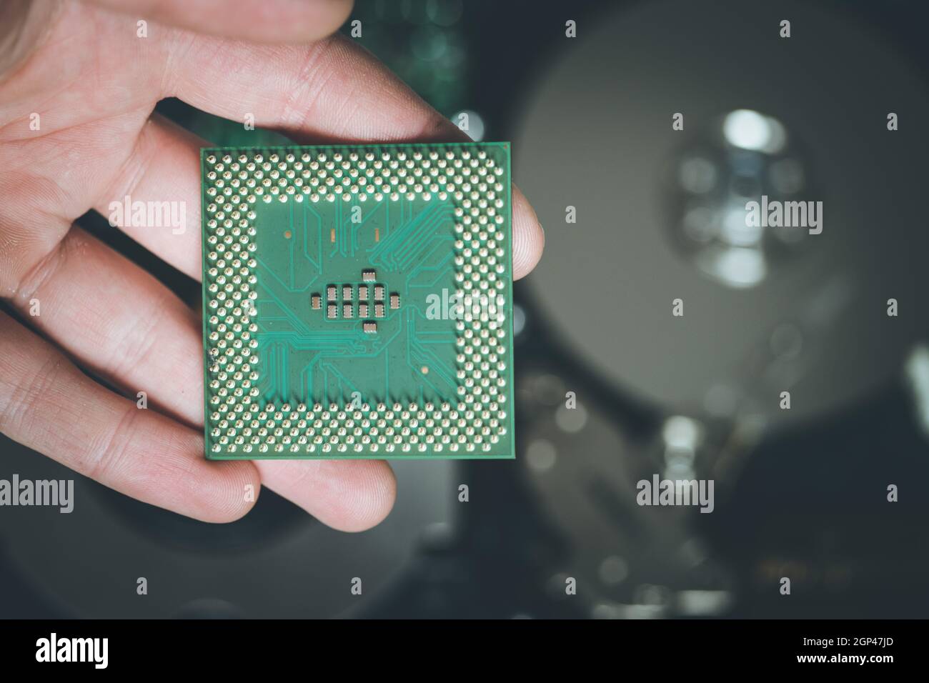 Male hand is holding a cpu, close up; Computer technology Stock Photo ...