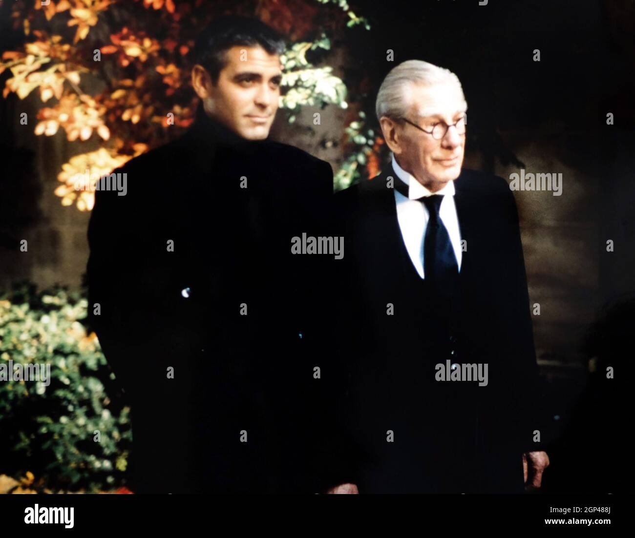 BATMAN & ROBIN, from left, George Clooney, Michael Gough, 1997. ©Warner ...