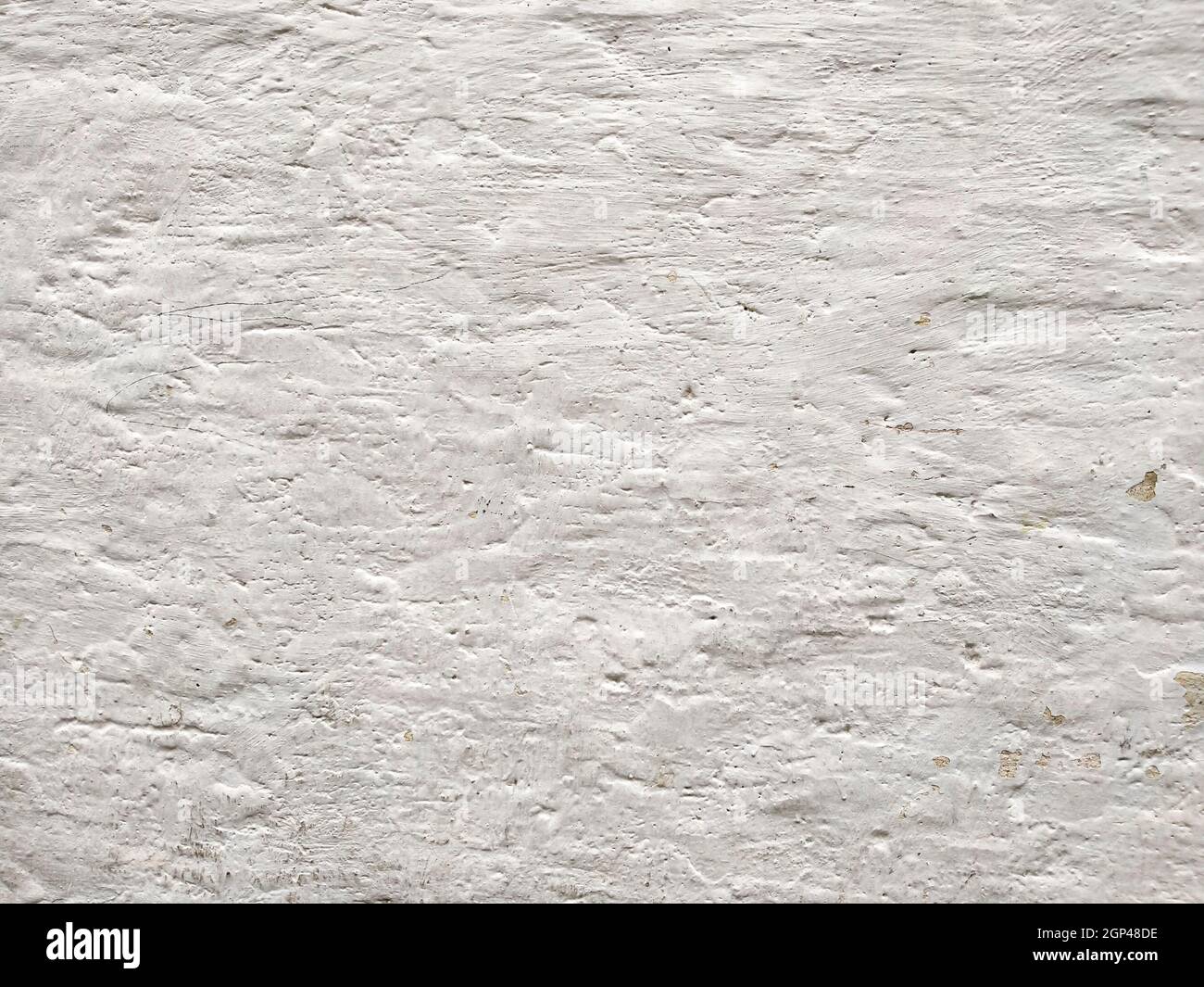 old wall with paint stains. background image in grunge white concrete ...