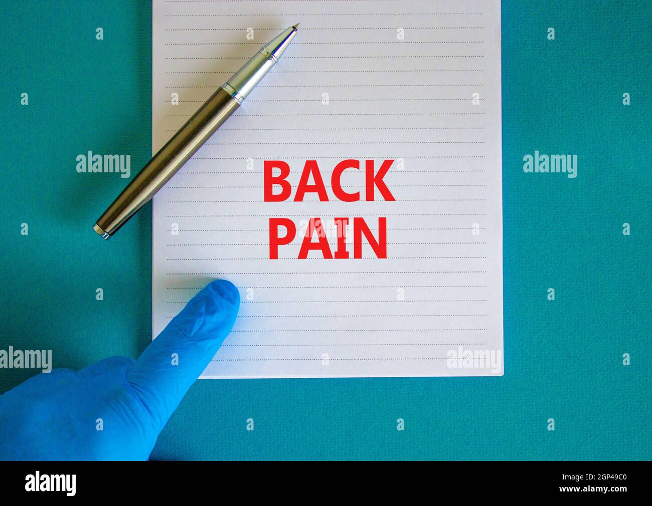 Back pain symbol. White note with words Back pain, beautiful blue ...
