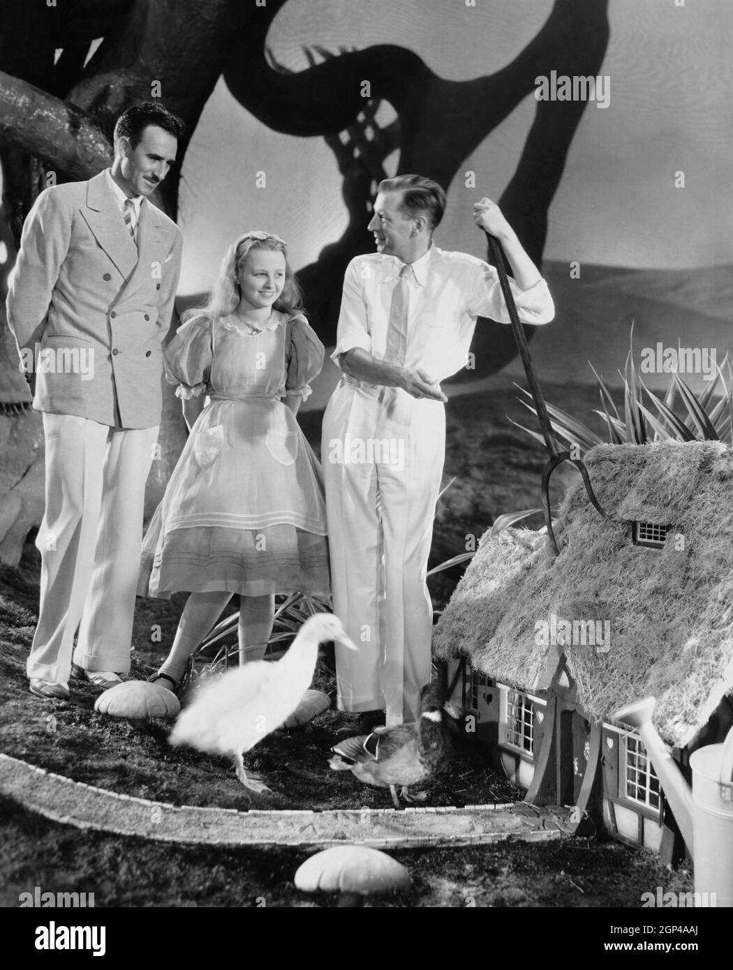 ALICE IN WONDERLAND, from left: director Norman Z. McLeod, Charlotte ...