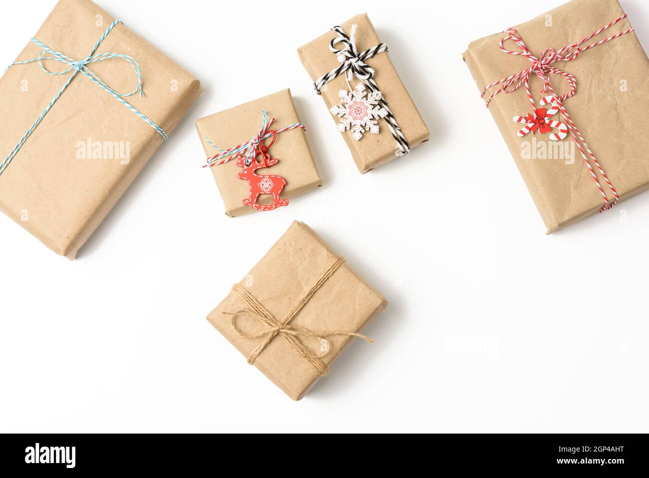 square box wrapped in brown kraft paper and tied with rope, gift on ...