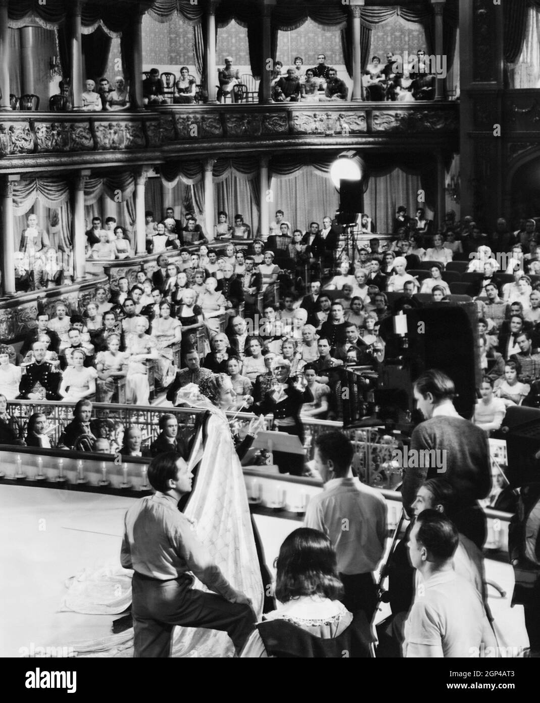 ANTHONY ADVERSE, on stage from left: director Mervyn LeRoy (back to ...