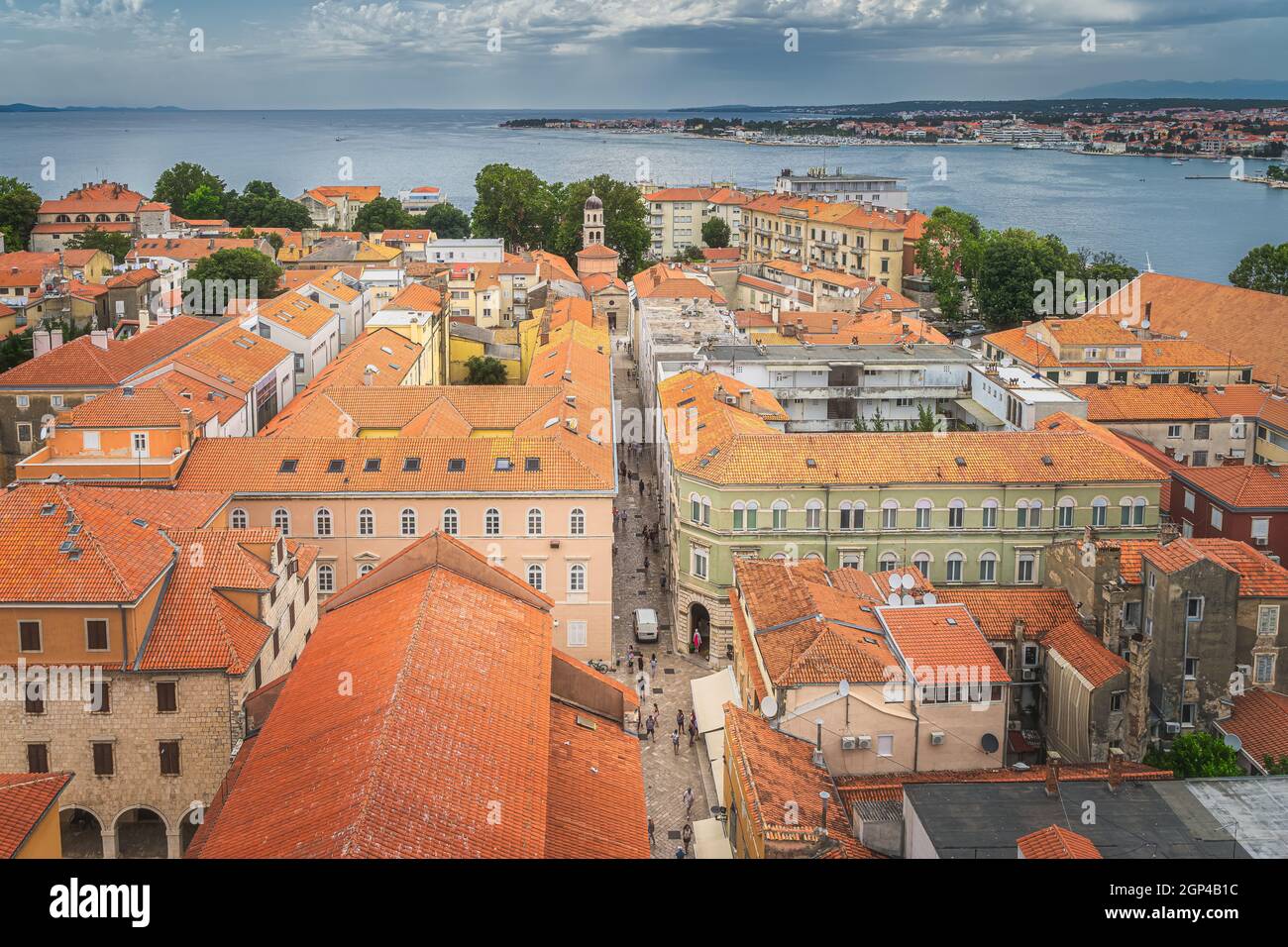 Drone or birds eye view on orange tiled roofs and narrow stone alleys ...