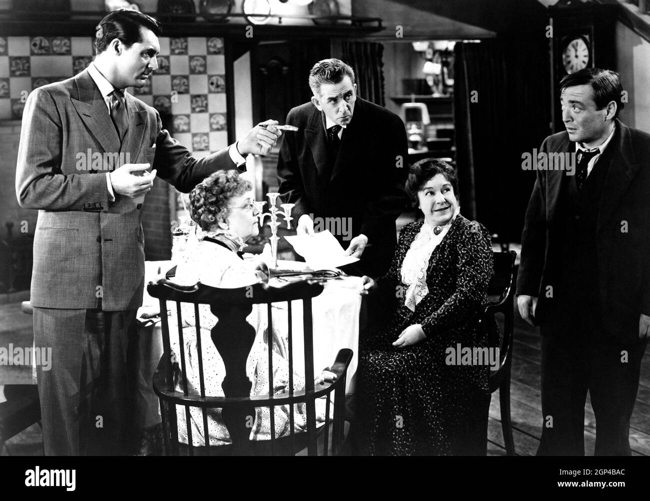 ARSENIC AND OLD LACE, from left, Cary Grant, Jean Adair, Edward Everett ...