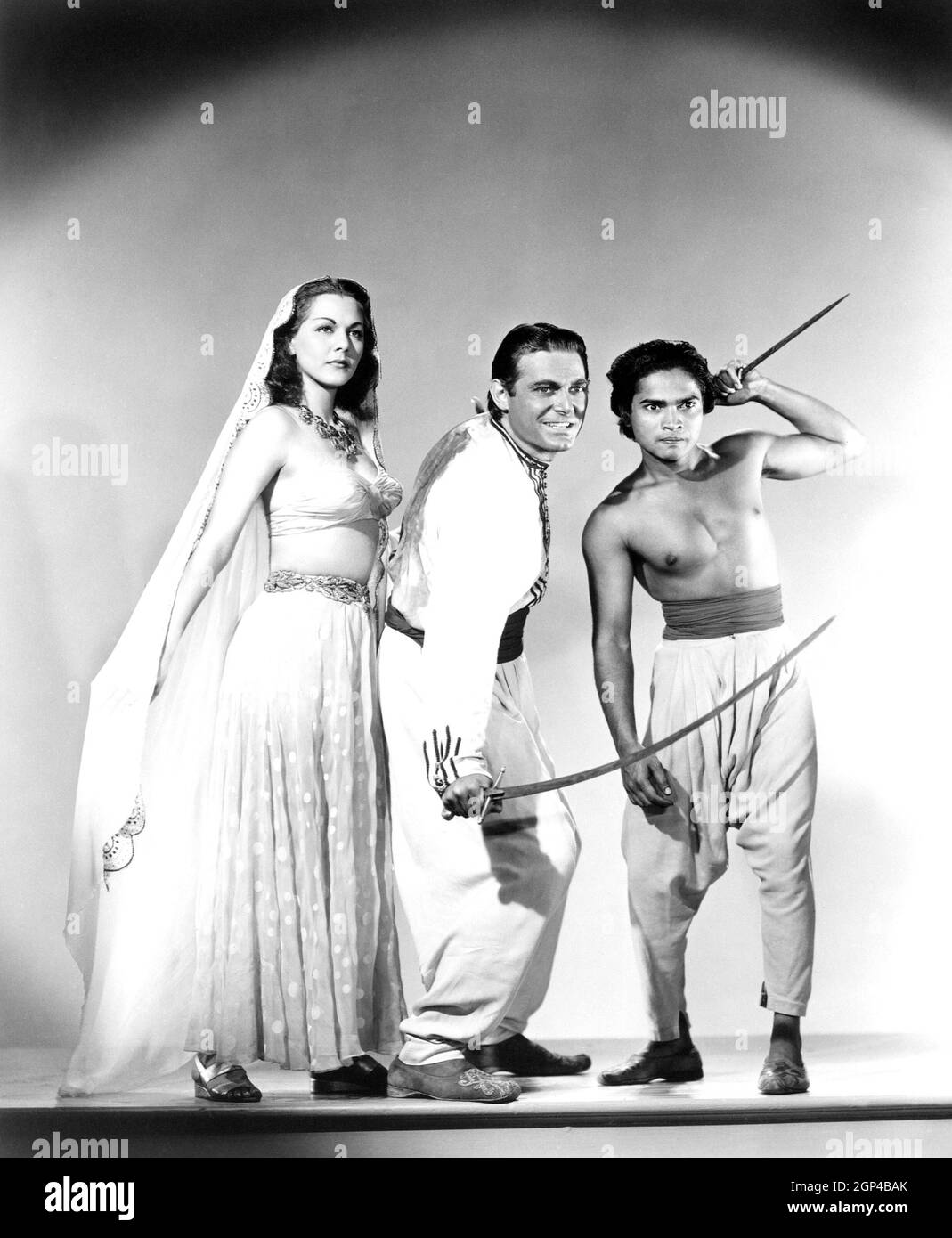 ARABIAN NIGHTS, from left, Maria Montez, Jon Hall, Sabu, 1942 Stock ...