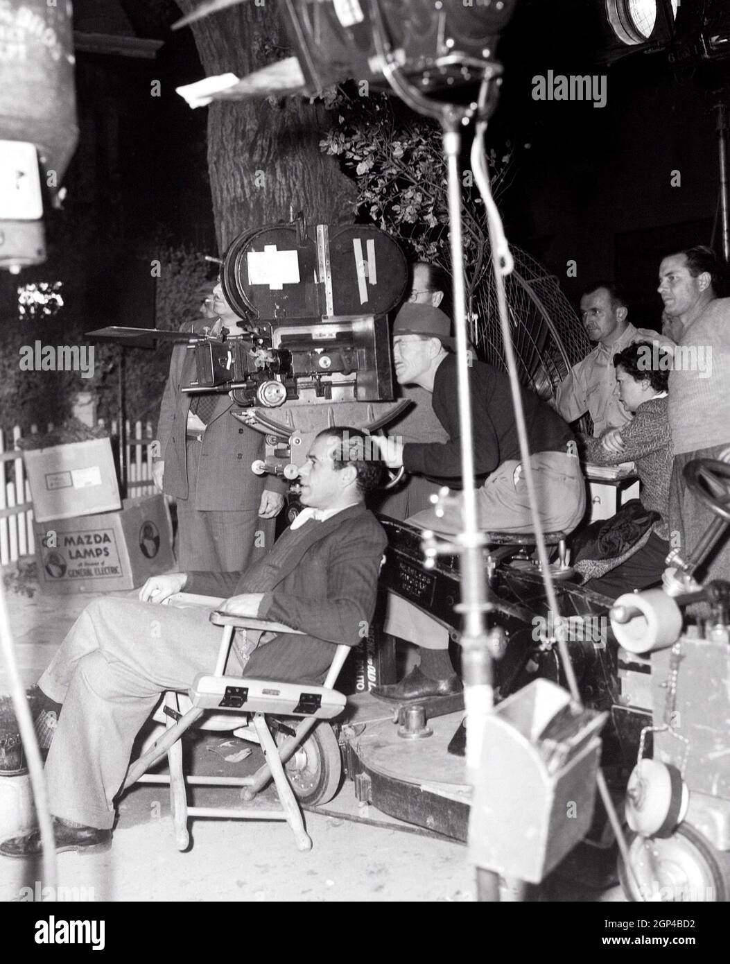 ARSENIC AND OLD LACE, director Frank Capra (seated), cinematographer ...