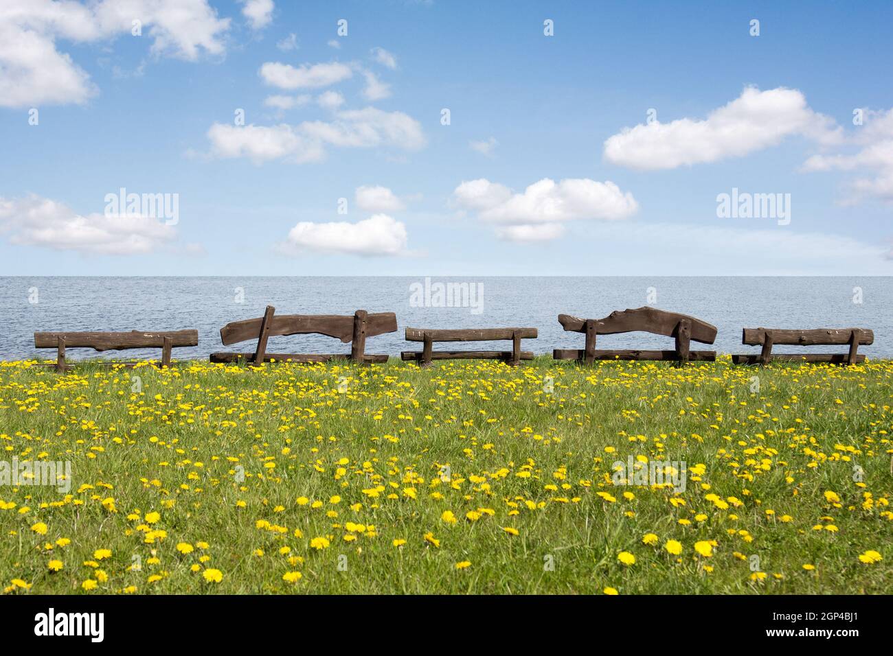 Five wooden benches at the sea shore,ideal place for resting Stock ...