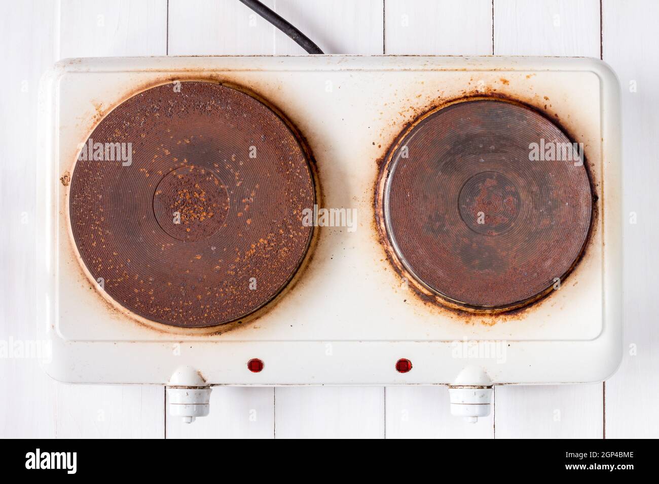 Top view of old rusty electric cooker Stock Photo - Alamy