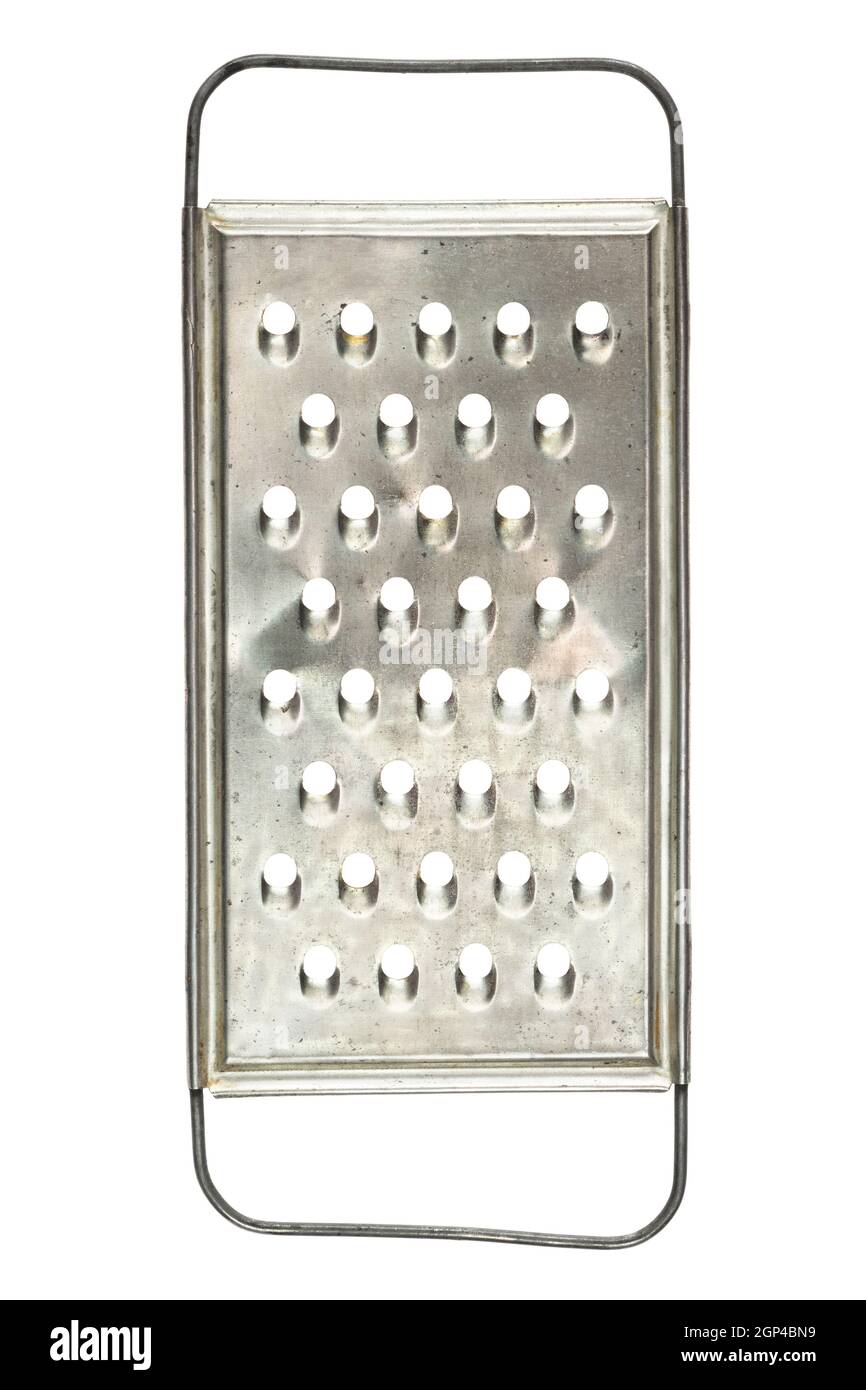 Old metal grater isolated on white background Stock Photo - Alamy