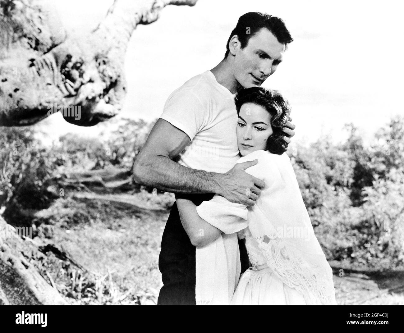 BEYOND ALL LIMITS, (aka FLOR DE MAYO), from left, Jack Palance, Maria Felix, 1959 Stock Photo ...