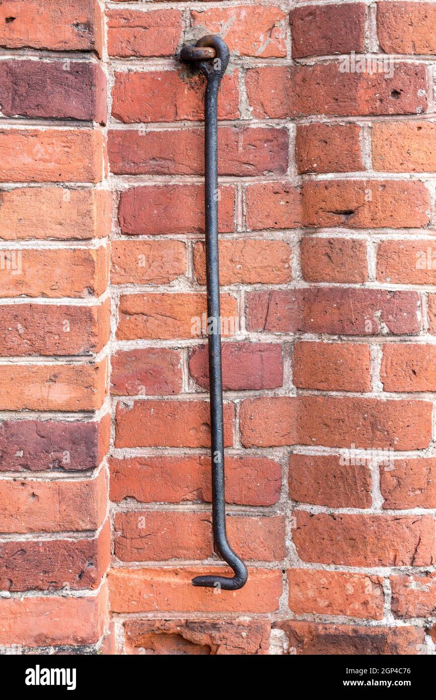 Rusted metal hook attached to wall Stock Photo - Alamy