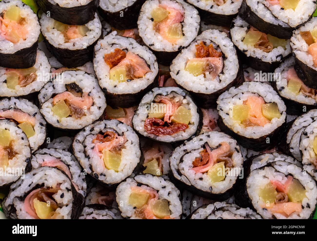 Top view of stack of Japanese sushi maki roll plate. Served in Japanese ...