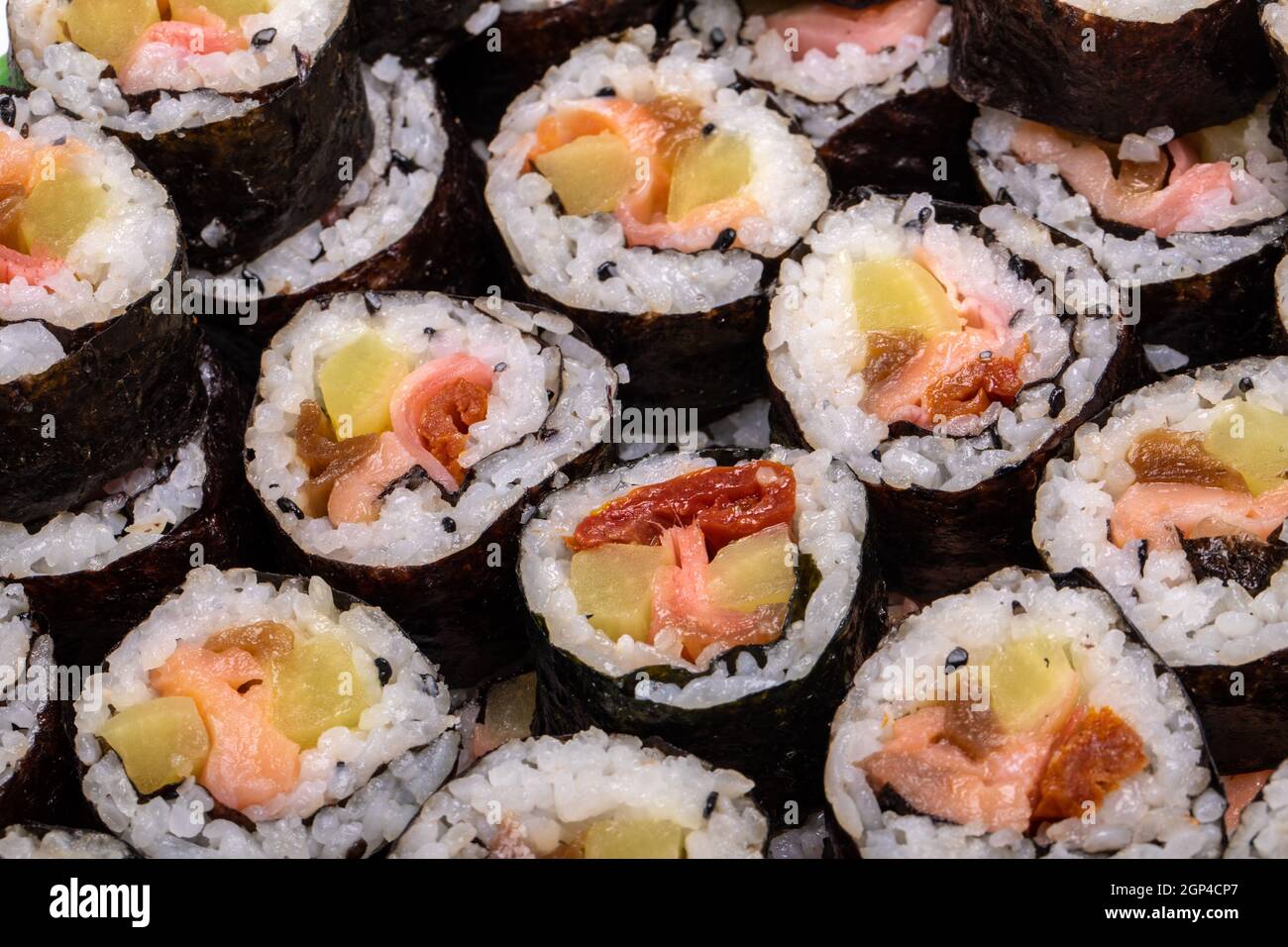 Top view of stack of Japanese sushi maki roll plate. Served in Japanese ...