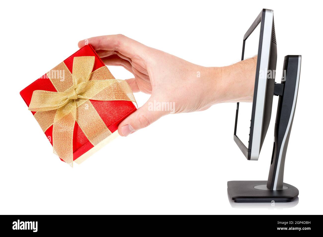 Hand with gift box comes out of monitor.Isolated on white background ...