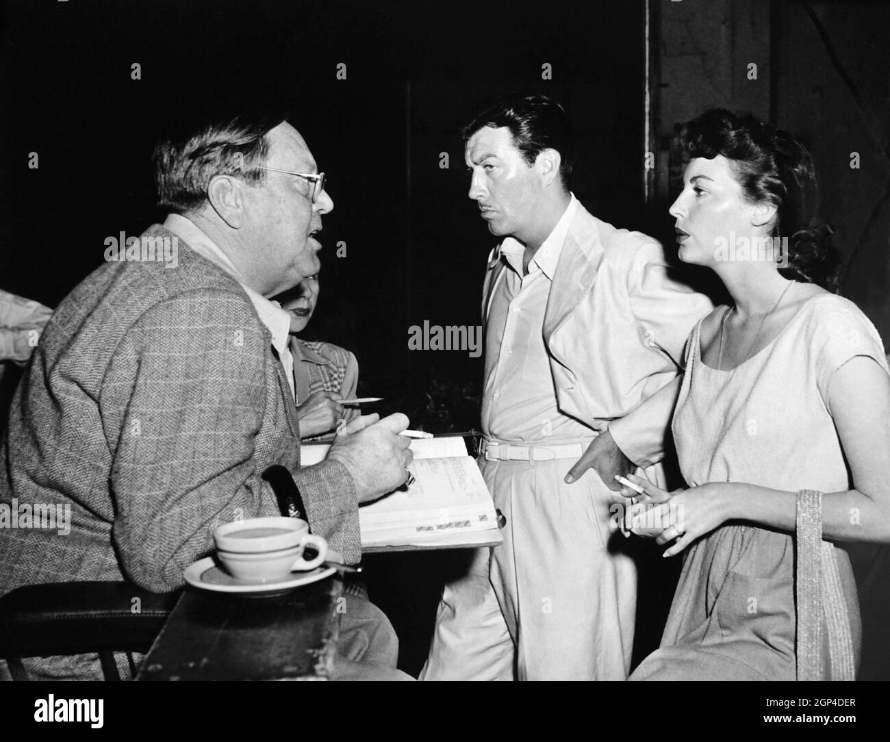 THE BRIBE, from left: director Robert Z. Leonard, Robert Taylor, Ava ...