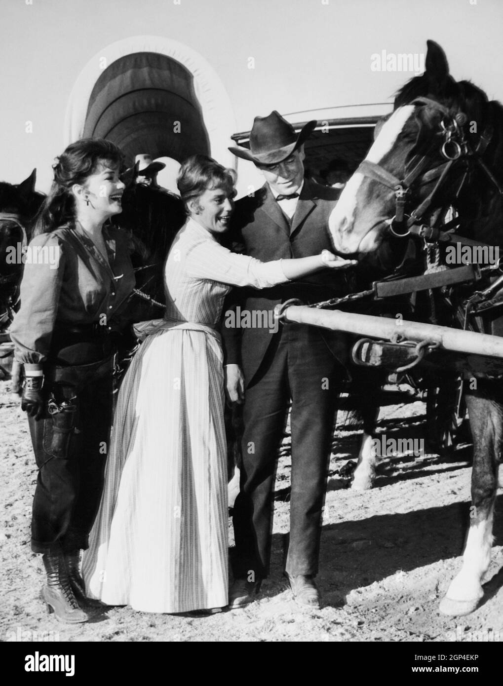 CIMARRON, from left: Anne Baxter, Maria Schell, Glenn Ford on set, 1960 ...