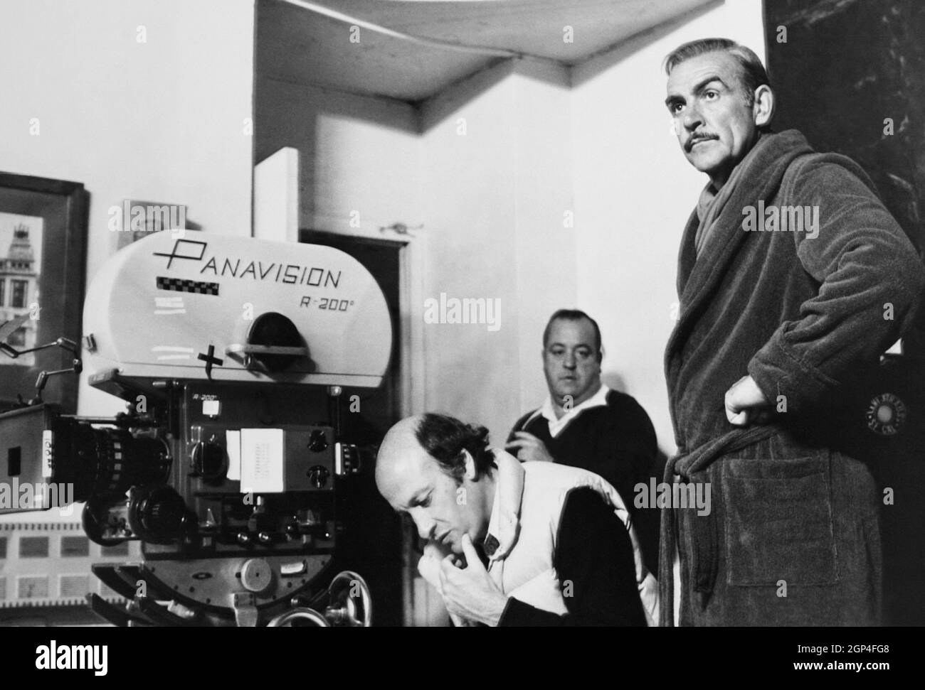 CUBA, front from left: director Richard Lester, Sean Connery on set ...