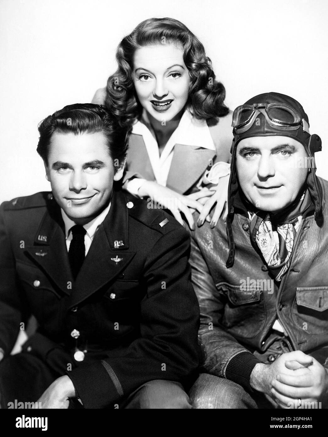 FLIGHT LIEUTENANT, from left, Glenn Ford, Evelyn Keyes, Pat O'Brien ...