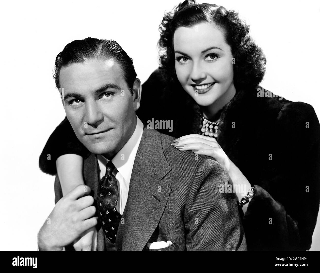 FREE, BLONDE AND 21, from left, Henry Wilcoxon, Lynn Bari, 1940. TM ...