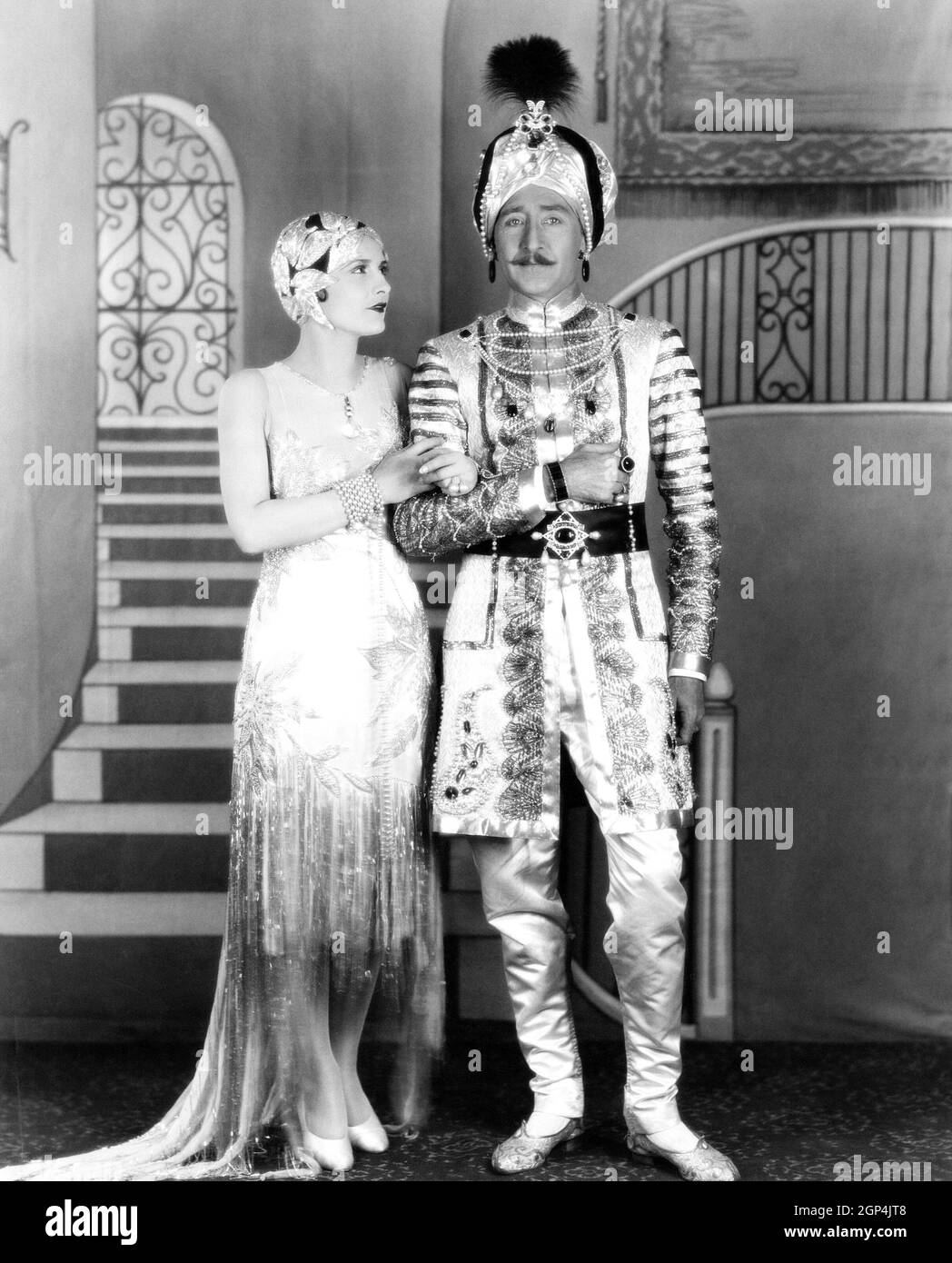 HIS TIGER WIFE, from left, Evelyn Brent (in a gown by Travis Banton and ...