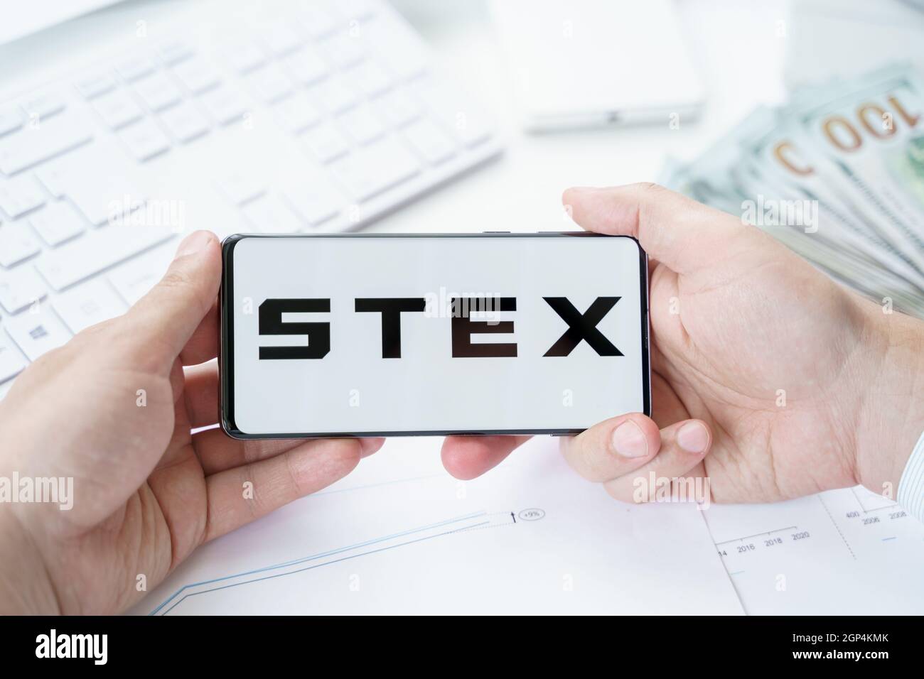 Russia Moscow 20.05.2021 Stex logo in mobile phone. Cryptocurrency ...