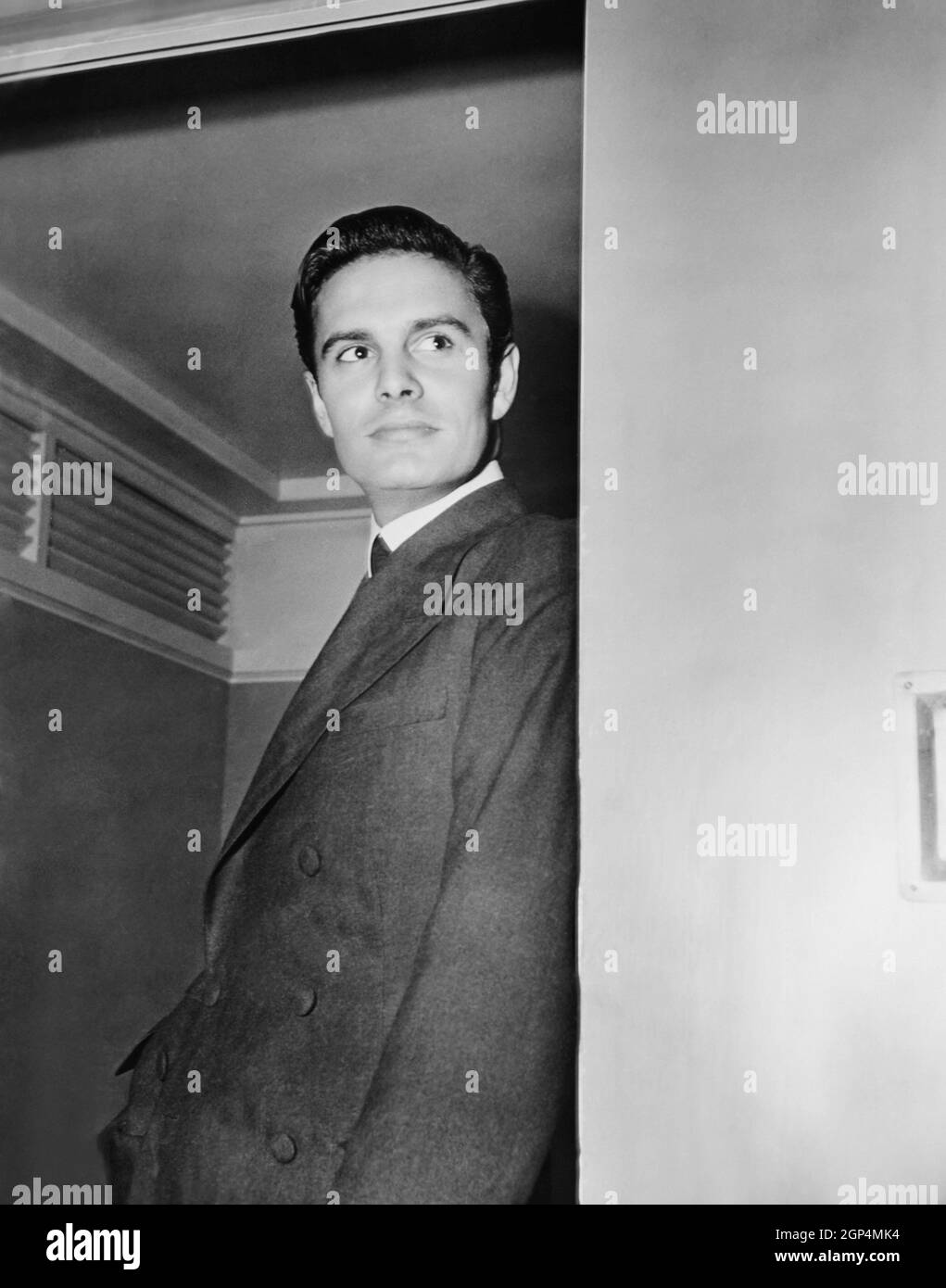 LETTER FROM AN UNKNOWN WOMAN, Louis Jourdan in his dressing room on set ...