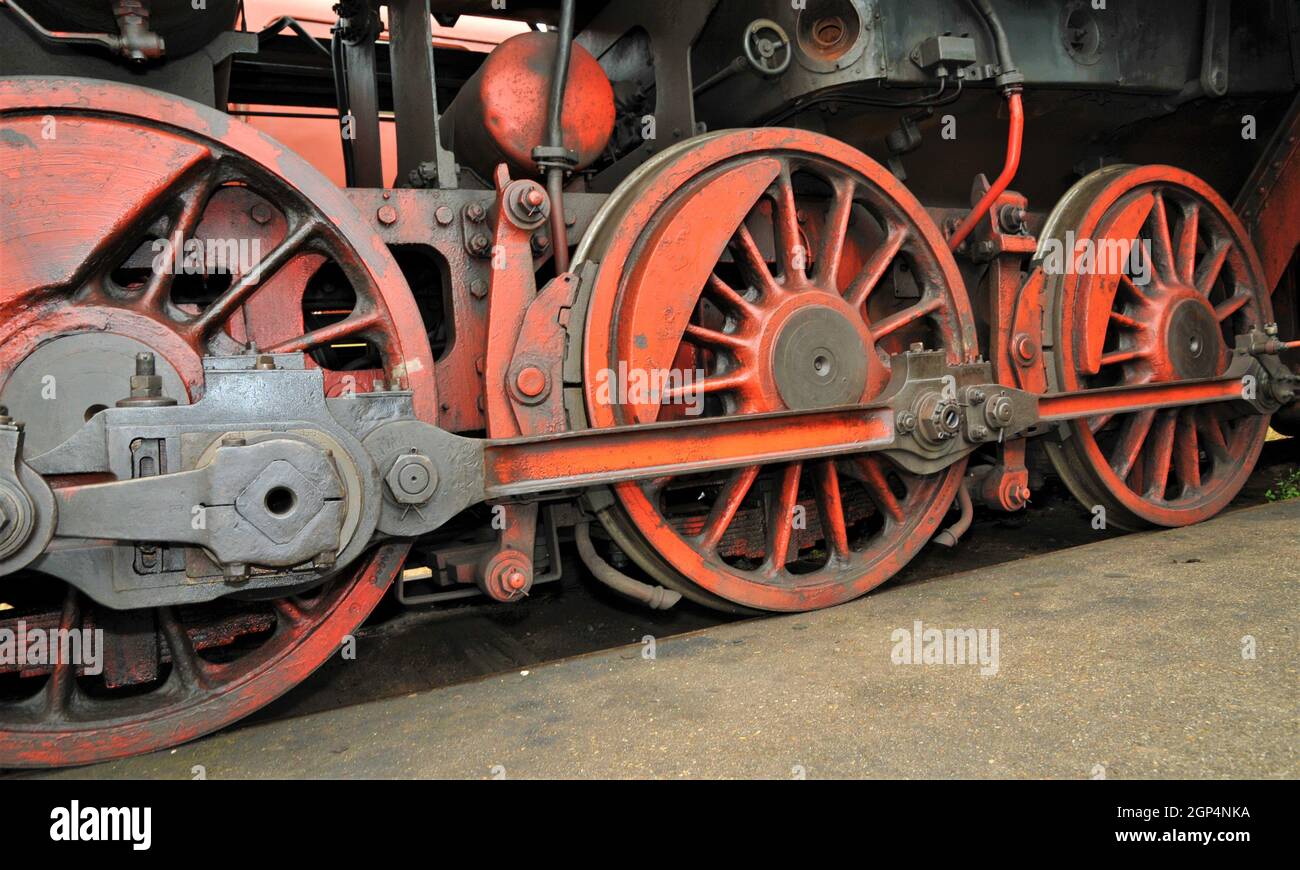 Old red train wheels of a old steam locomotive in the vintage and ...