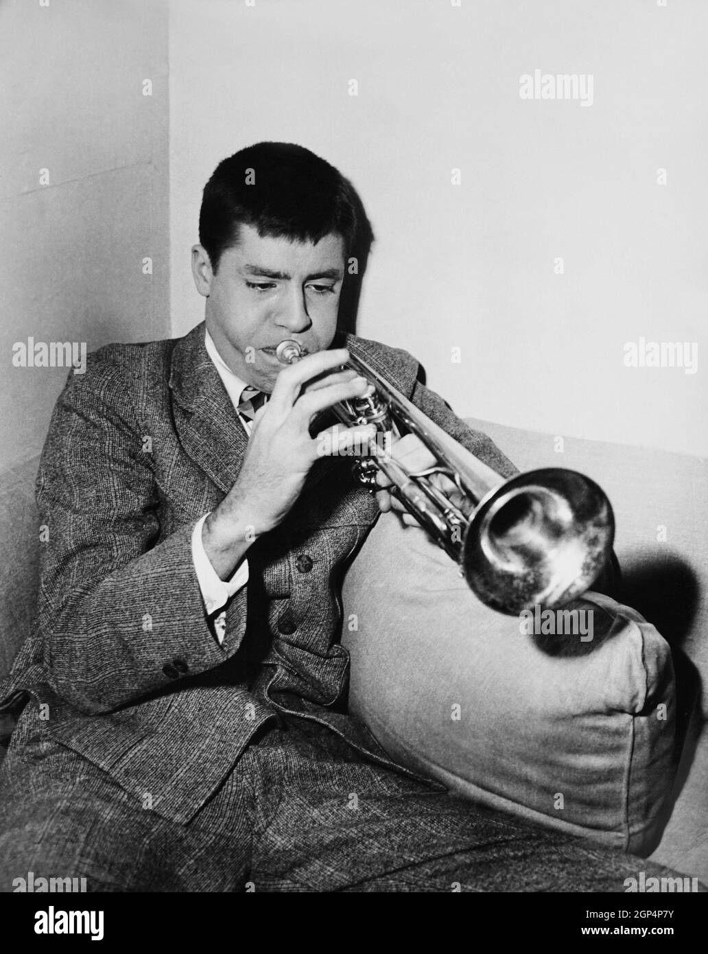 MY FRIEND IRMA GOES WEST, Jerry Lewis practicing the trumpet on set ...