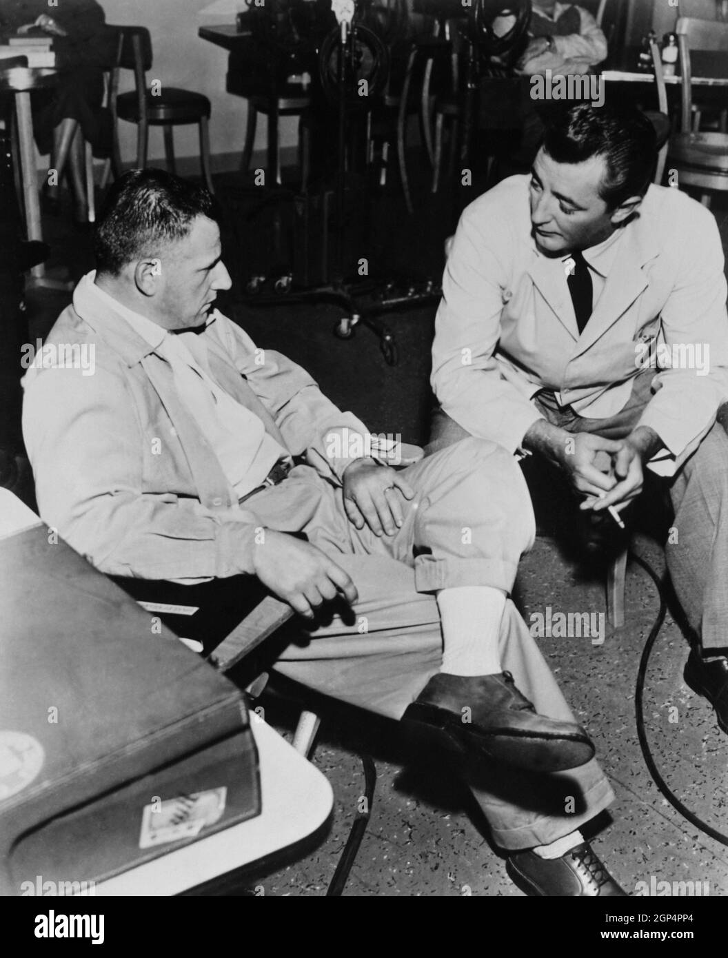 NOT AS A STRANGER, from left: director Stanley Kramer, Robert Mitchum ...