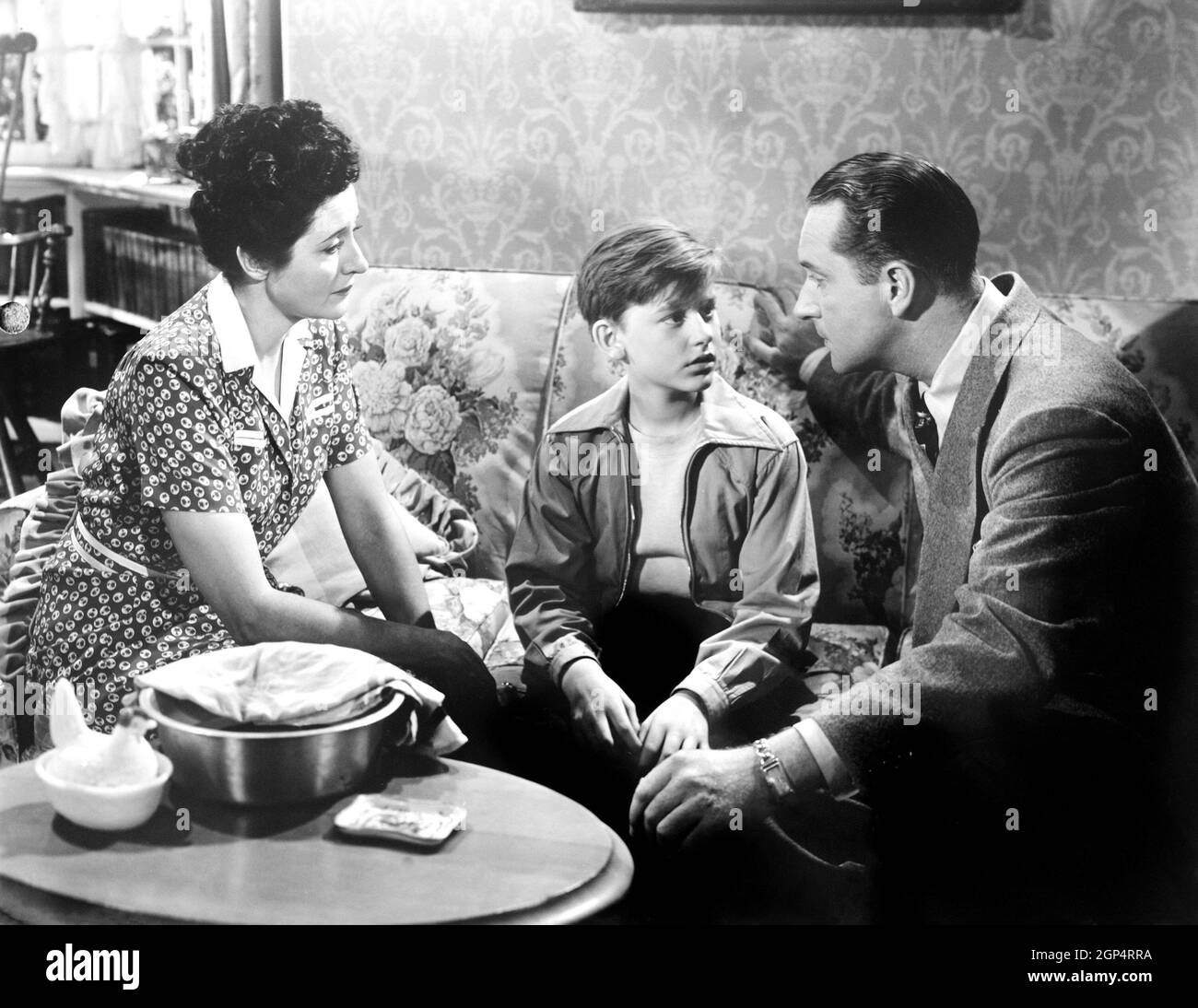 ON THE SUNNY SIDE, from left, Katharine Alexander, Roddy McDowall, Donald Douglas, 1942. TM and ...
