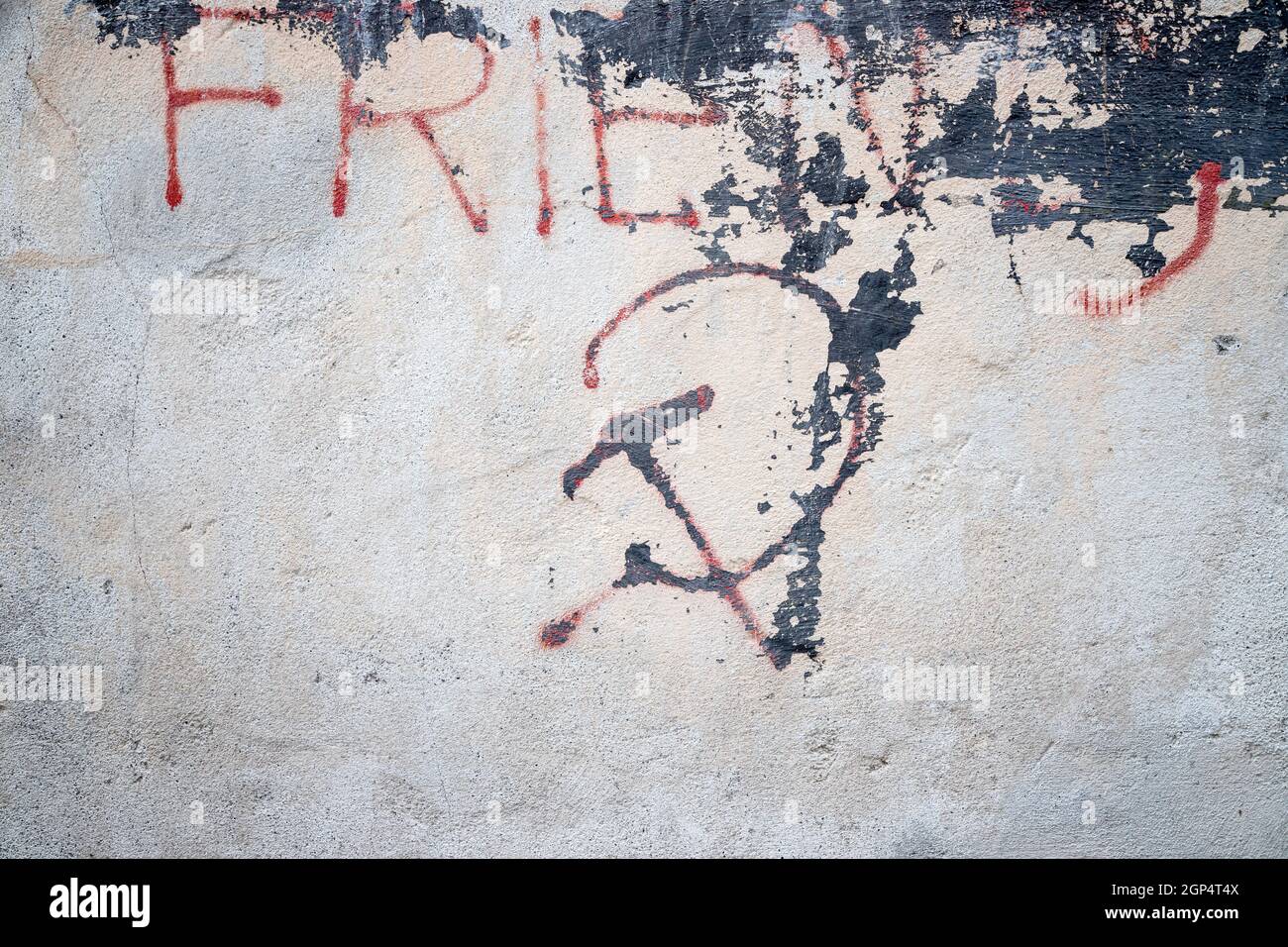 Old grungy communism symbol graffiti on a wall, red color Stock Photo ...