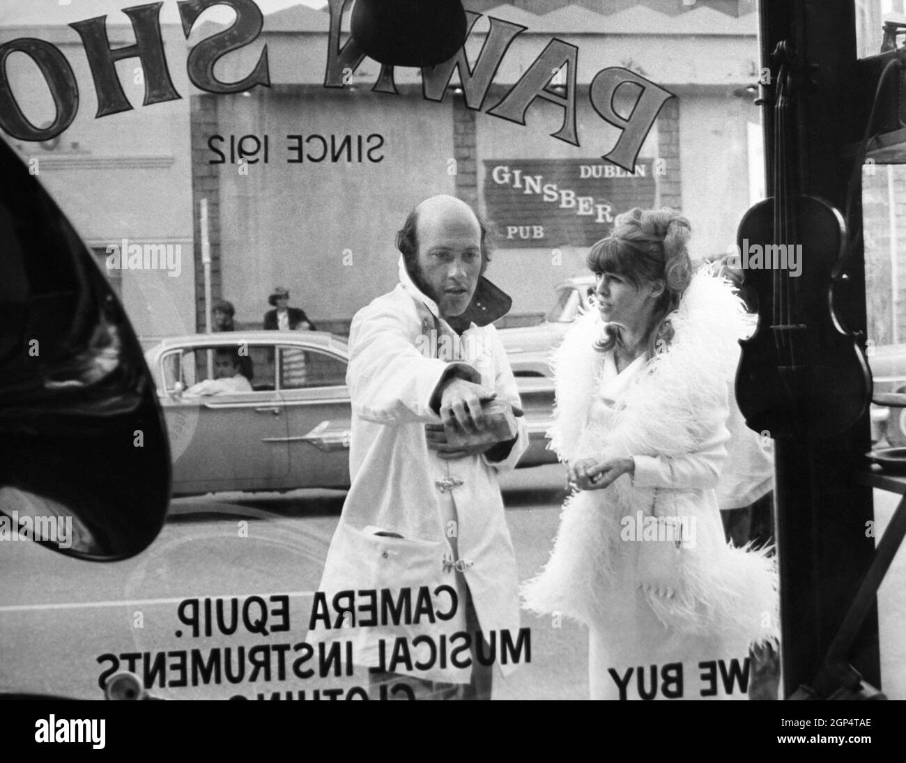 PETULIA, from left: director Richard Lester, Julie Christie on set ...