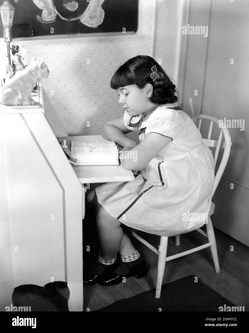 PEPPER, Jane Withers, doing her schoolwork on-set, 1936. TM & Copyright ©20th Century-Fox Film ...