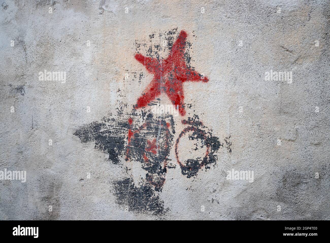 Old grungy communism symbol graffiti on a wall, red color Stock Photo ...
