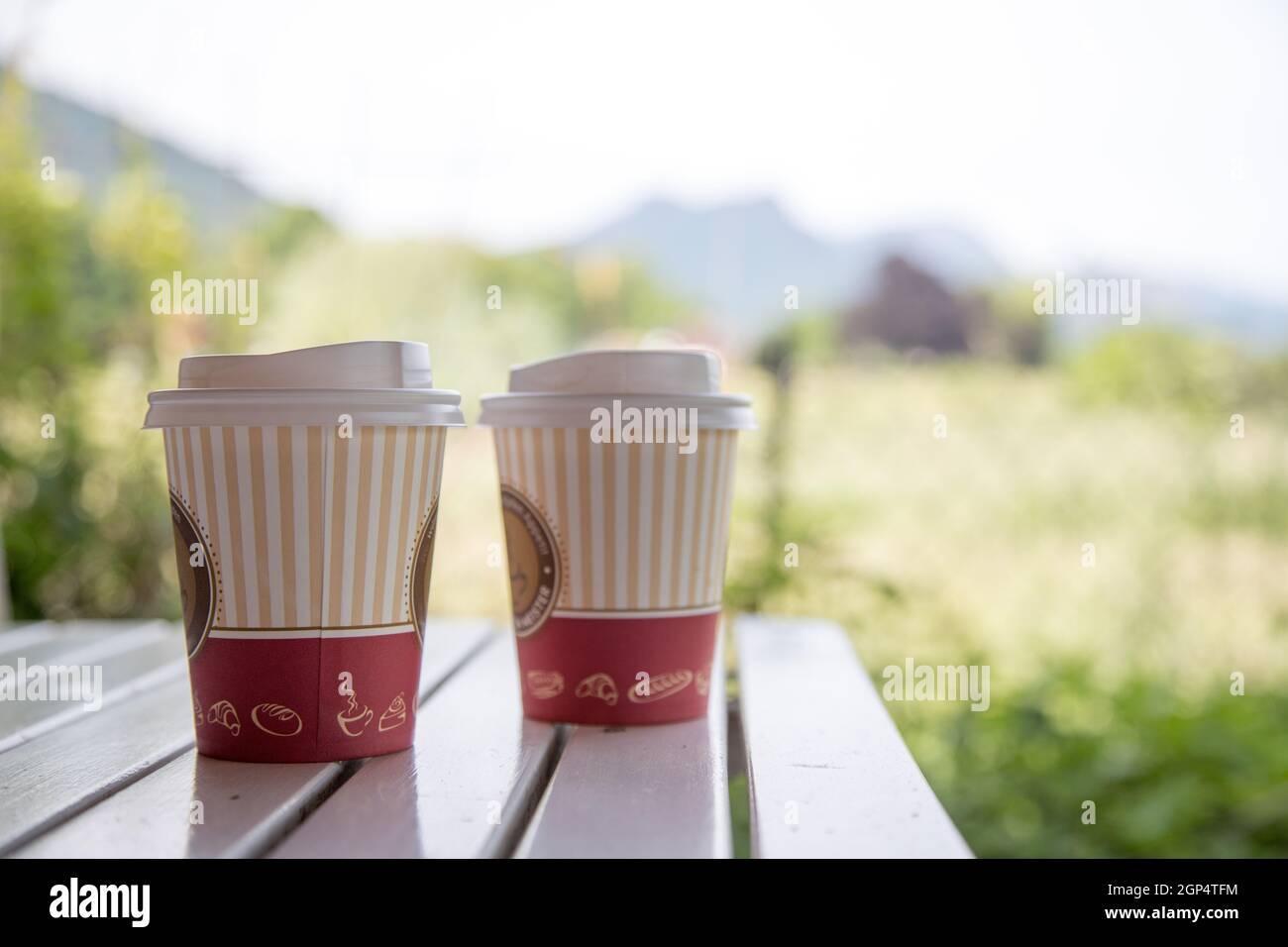 Coffee in paper cup for making a break, outdoors Stock Photo - Alamy