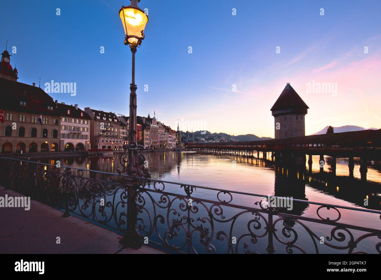 Luzern riverfront and wooden Chapel Bridge and tower view, town in ...