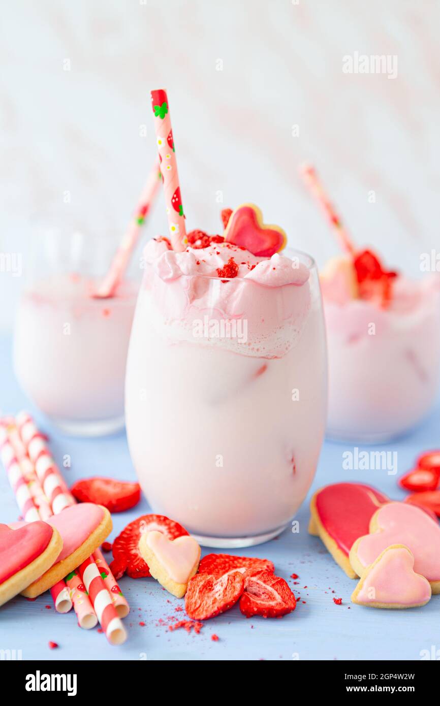 Ice cold milk shake with cream and dried stawberries Stock Photo - Alamy