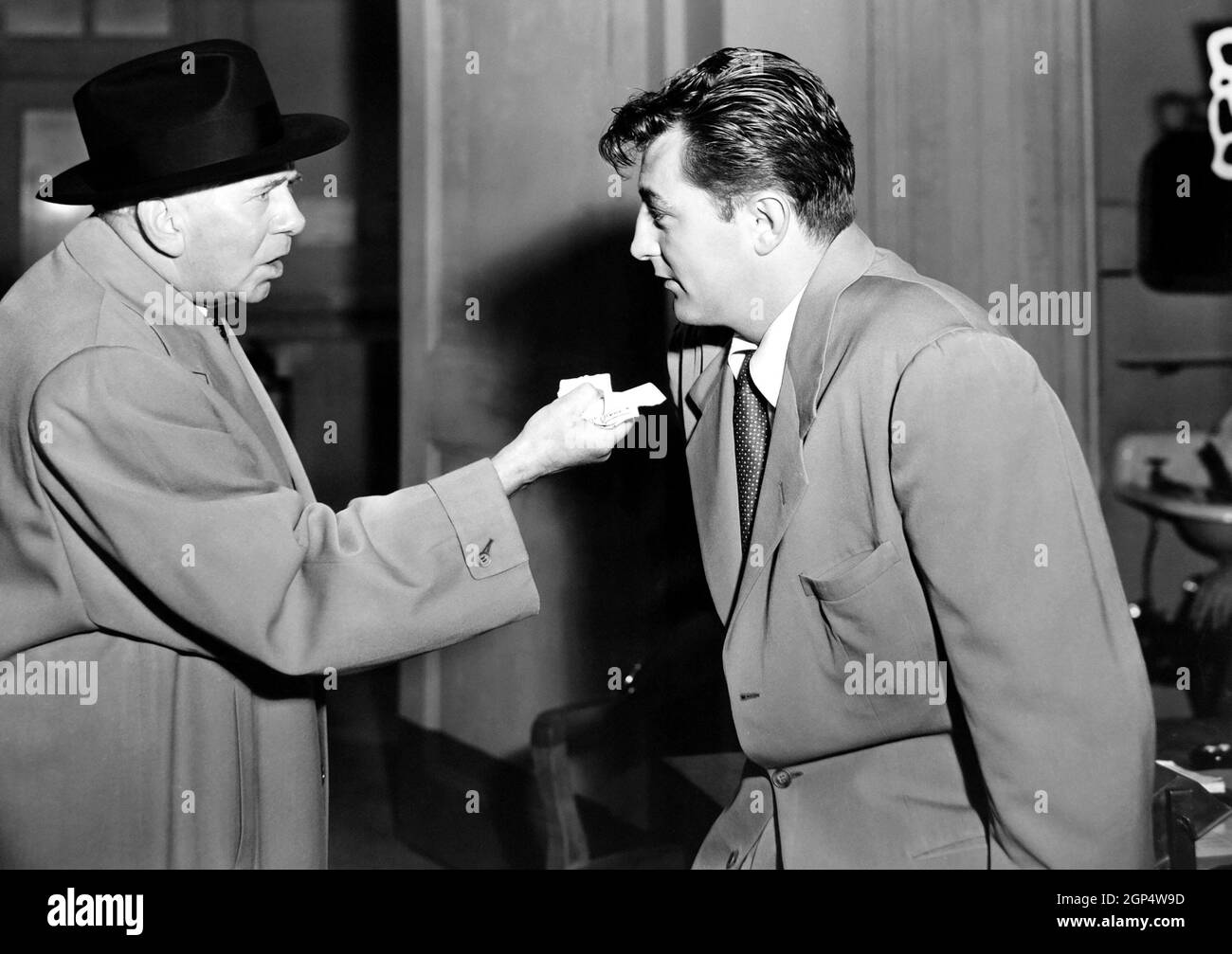 THE RACKET, from left, Ray Collins, Robert Mitchum, 1951 Stock Photo ...
