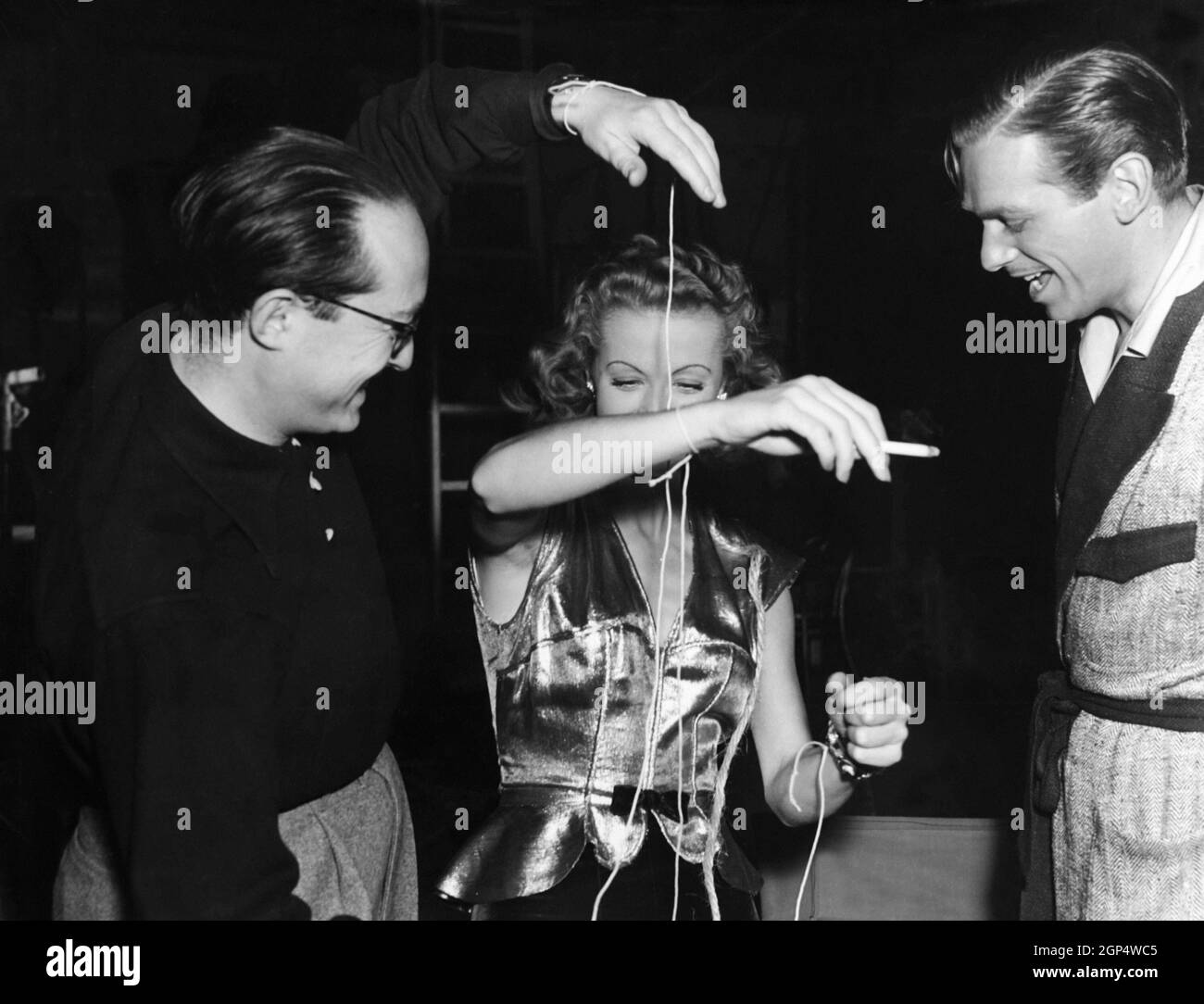THE RAGE OF PARIS, from left: director Henry Koster, Danielle Darrieux ...