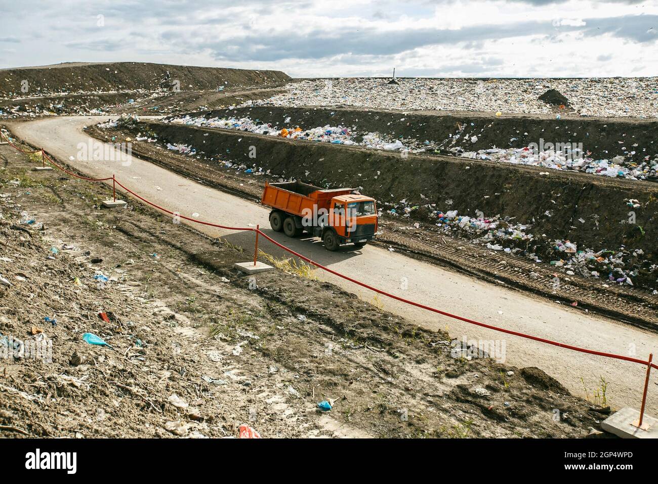 Terraces at the landfill. Arrival at the landfill of household waste ...