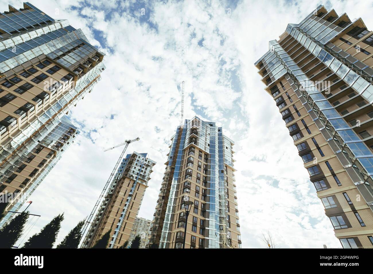 luxury residential high-rise buildings with mirrored glazing are under ...